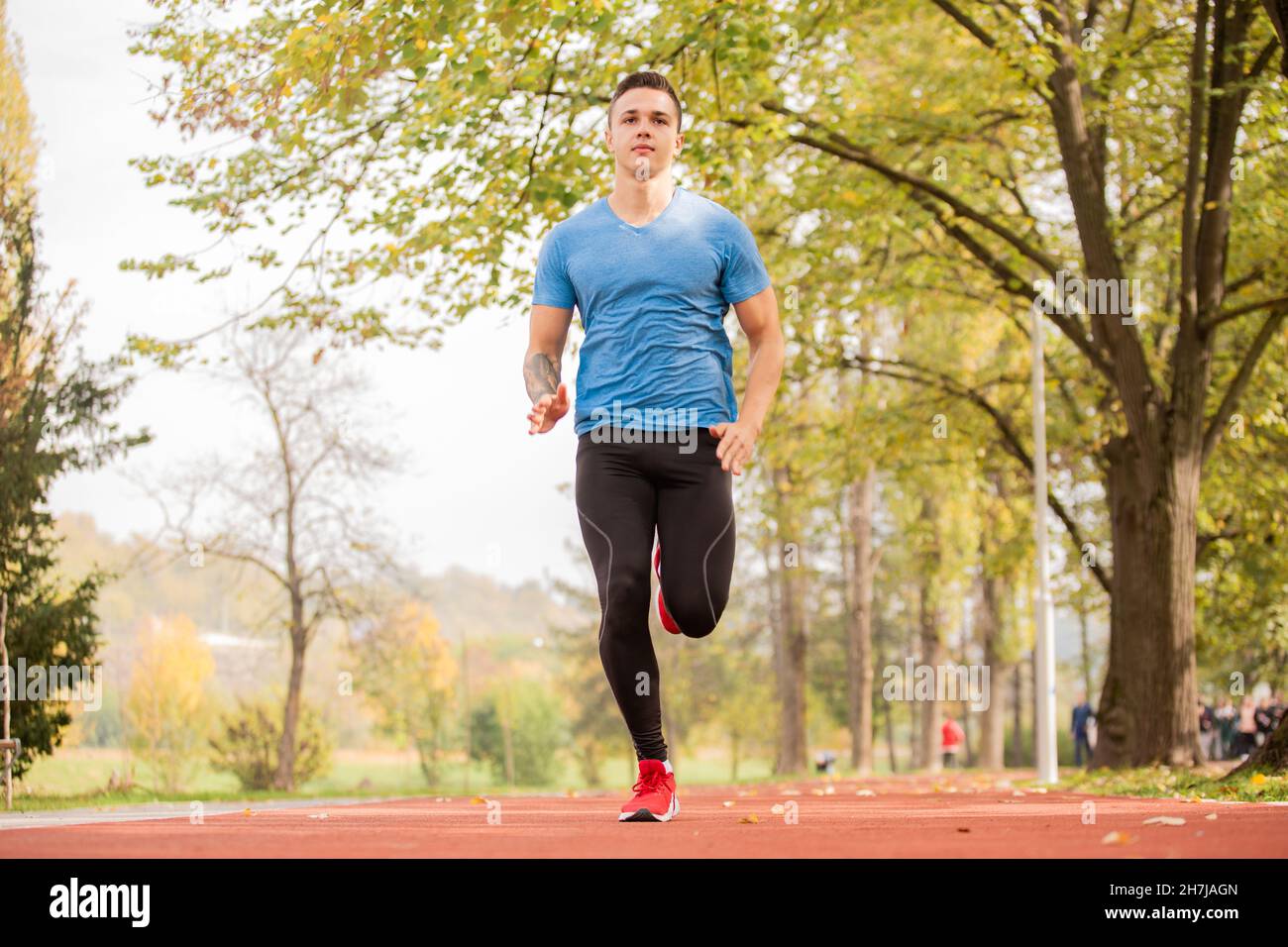 Man tracksuit 20s running hi-res stock photography and images - Alamy