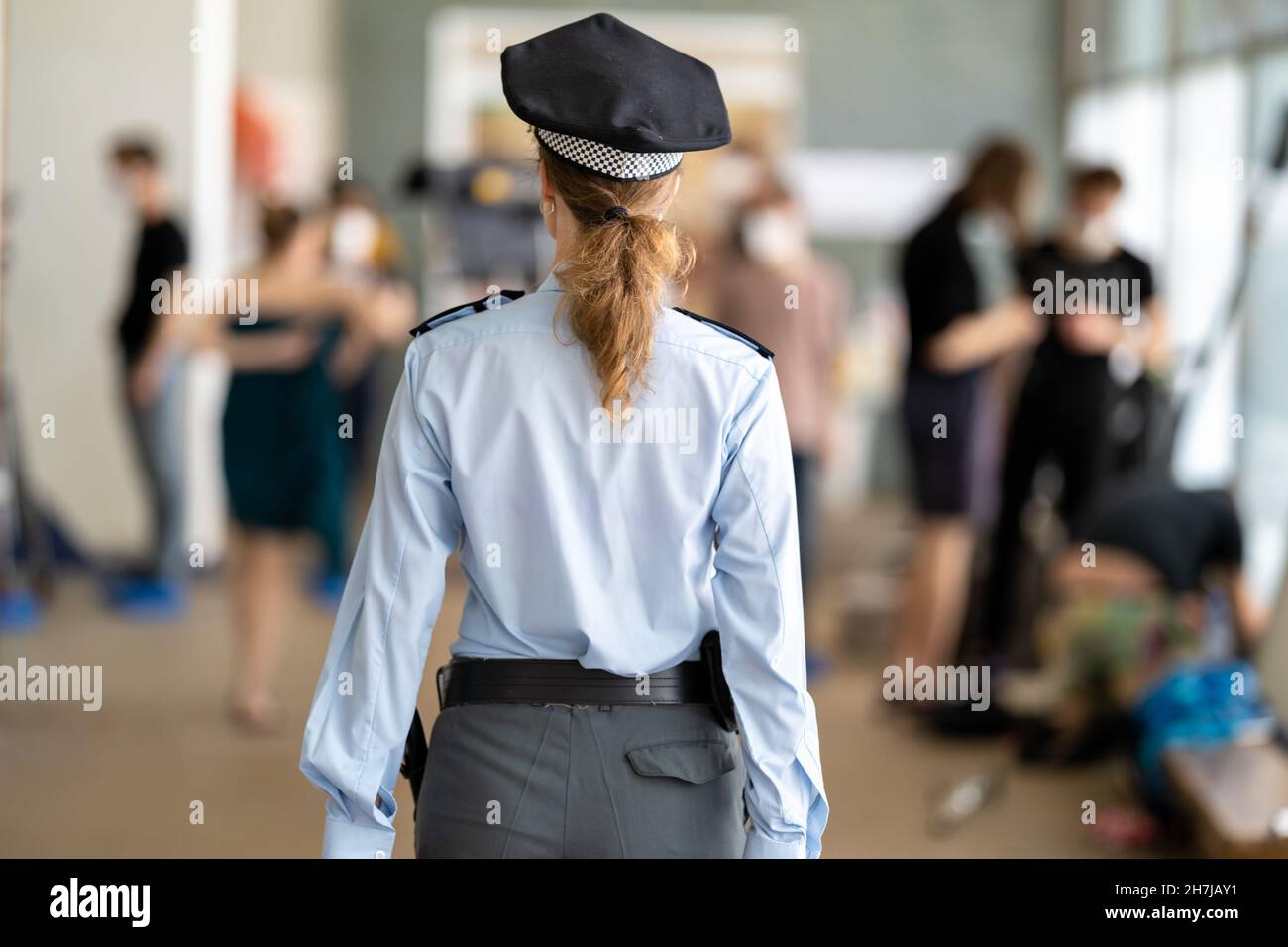 female police officer in uniform on duty during a public event Stock ...