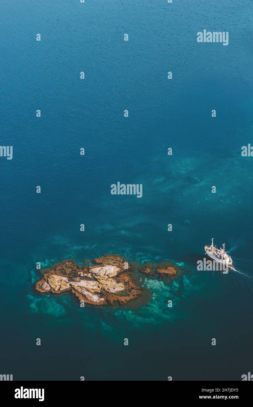 Aerial view island in ocean and ship landscape scenery from above ...