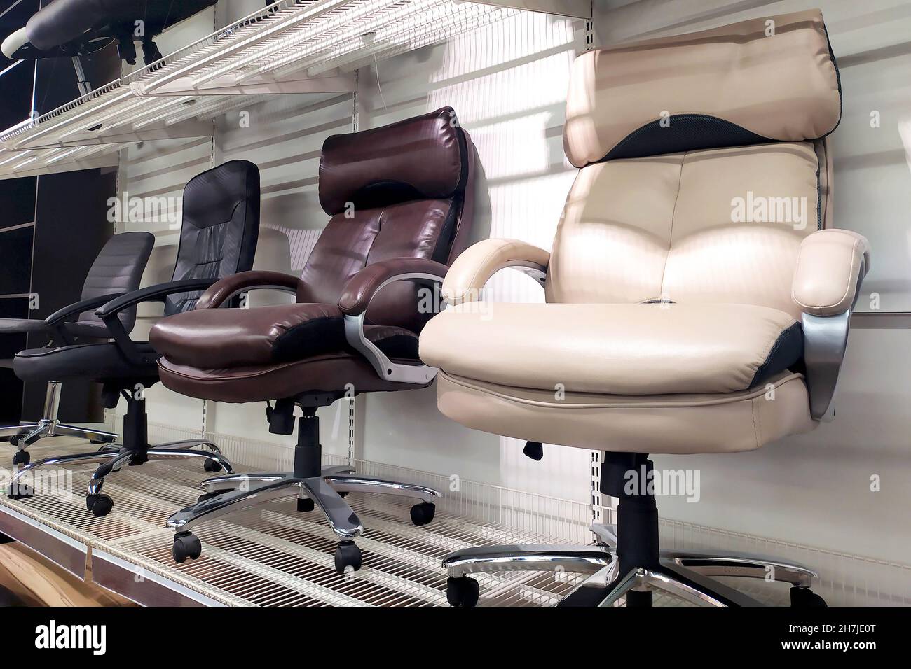 Different computer gamer soft ergonomic chairs in the furniture store ...