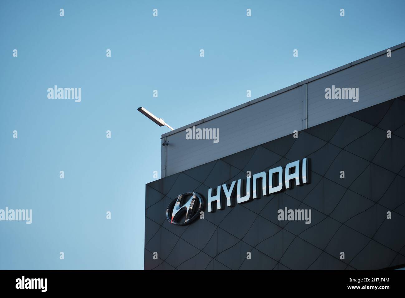 Hyundai logo at building facade Stock Photo - Alamy