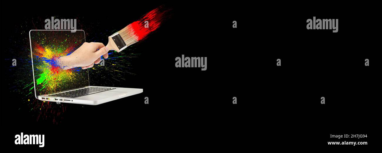 A hand with a paintbrush sticks out of the laptop screen. Isolated on ...