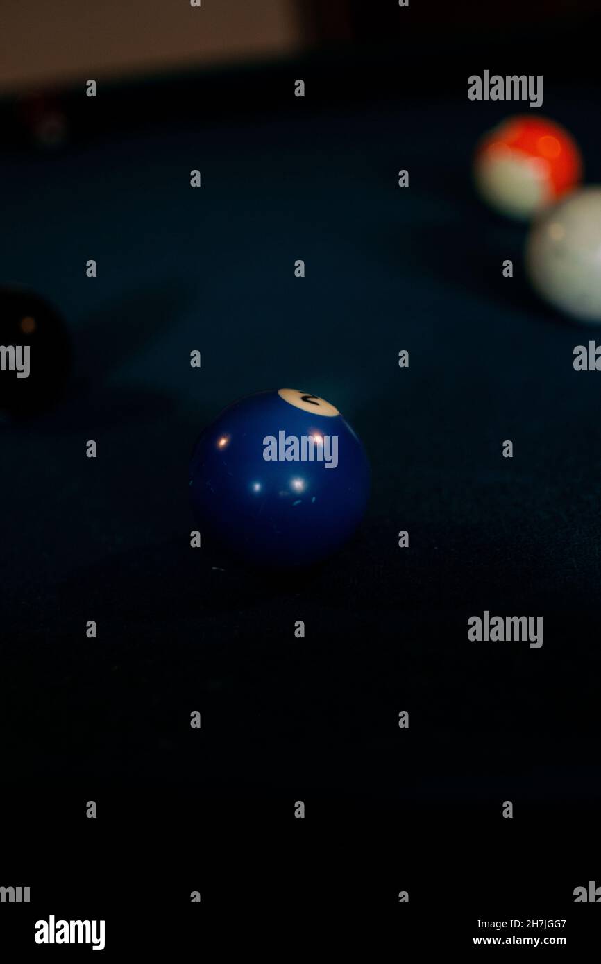 Vertical shot of a blue billiard ball on a pool table Stock Photo - Alamy