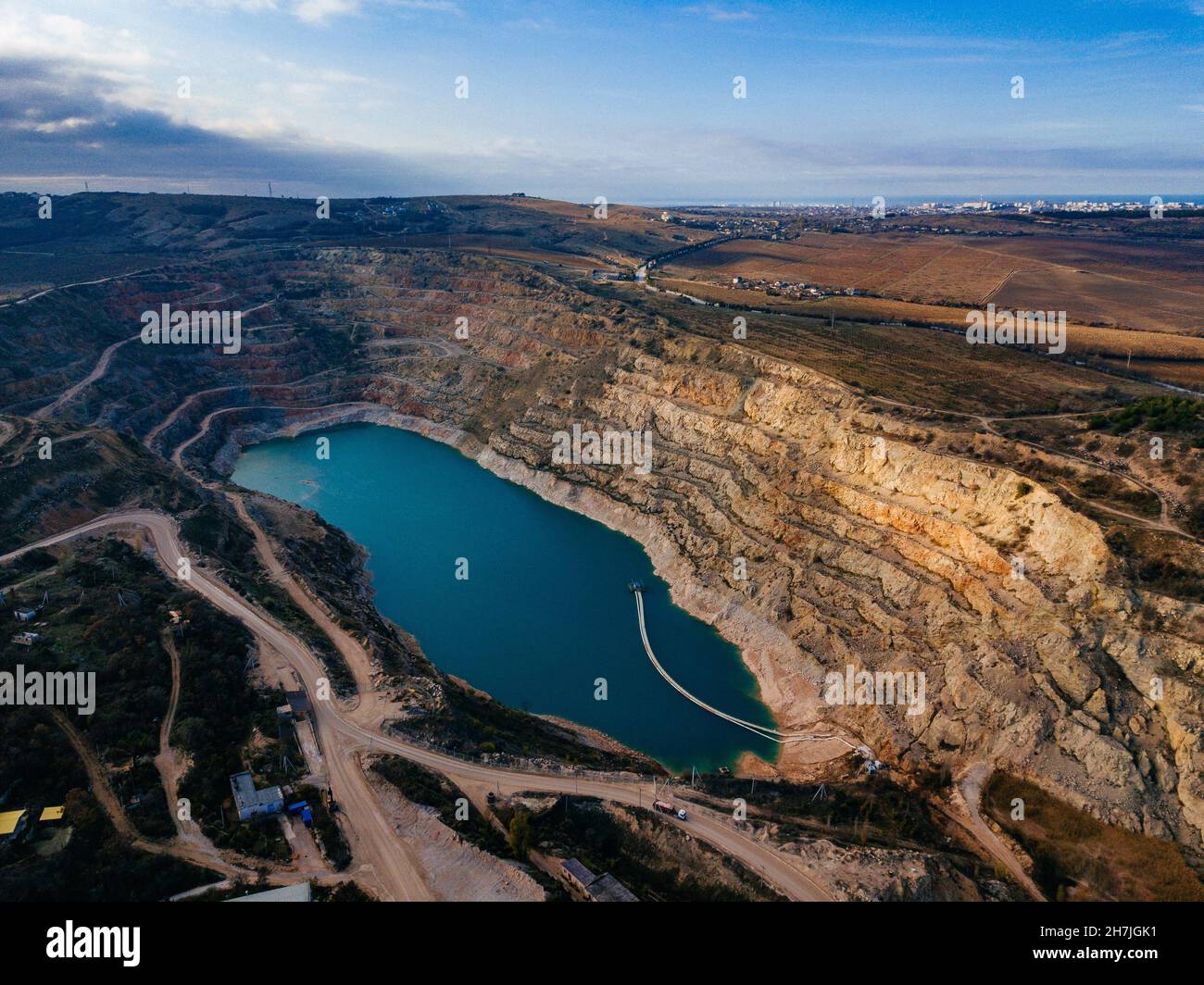 Abandoned limestone quarry with lake at the bottom Stock Photo - Alamy