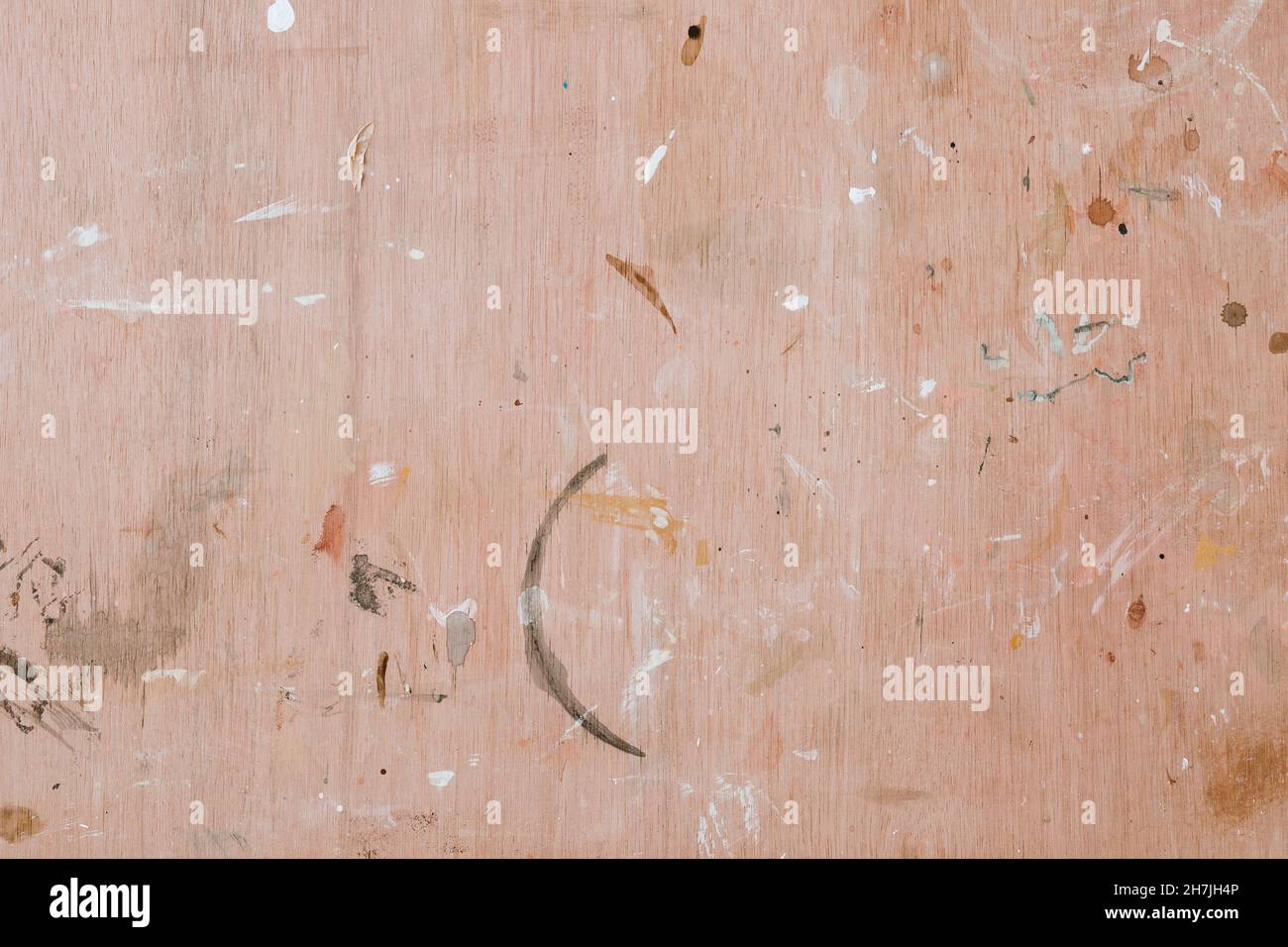 Colorful paint splashes on wooden board. Flat lay, top view. Abstract ...