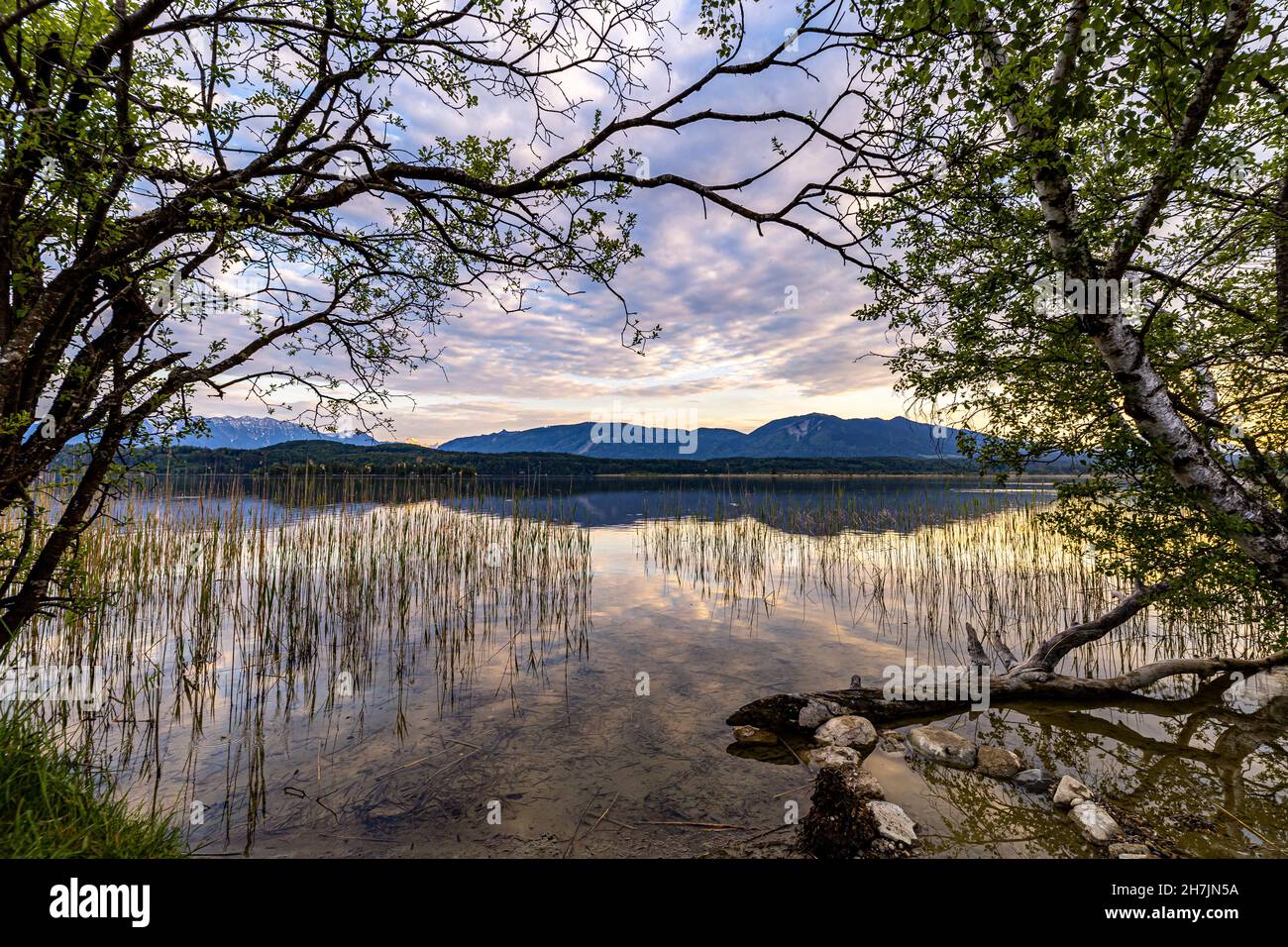 View over the water to the mountains at sunset at the moor areas at the ...