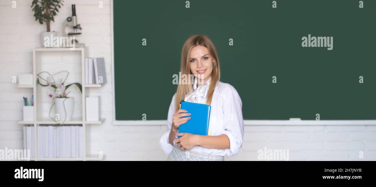 Student preparing exam and learning lessons in school classroom ...