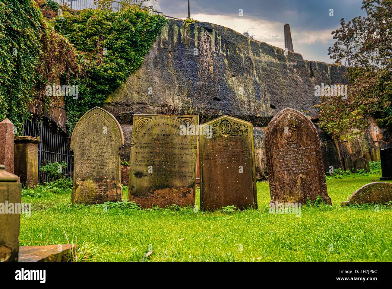 St James's Cemetery with names and information inscribed on gravestone ...
