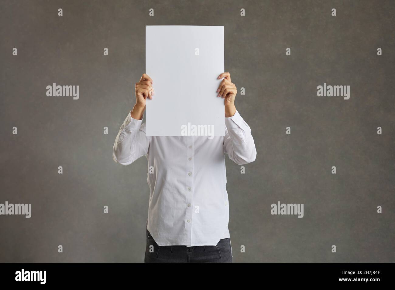 Man holding up a banner hi-res stock photography and images - Alamy