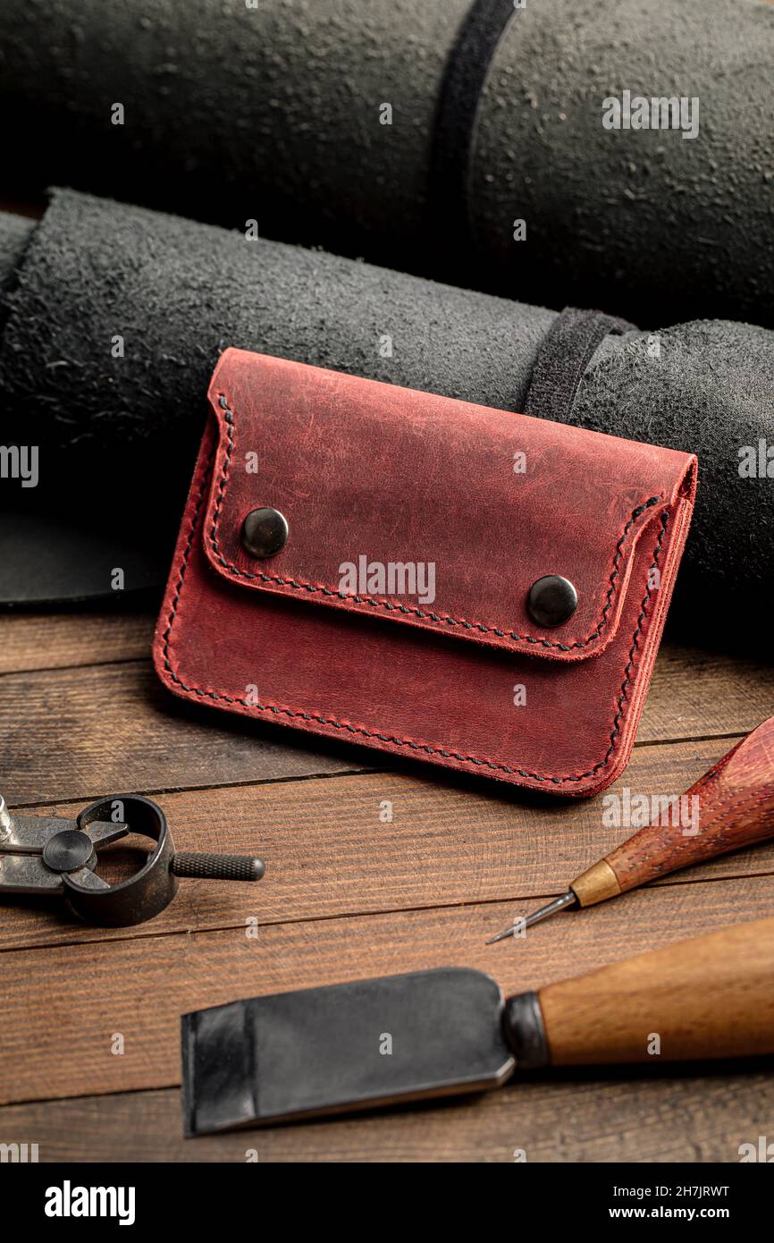 Side view on hand crafted red leather wallet Stock Photo - Alamy