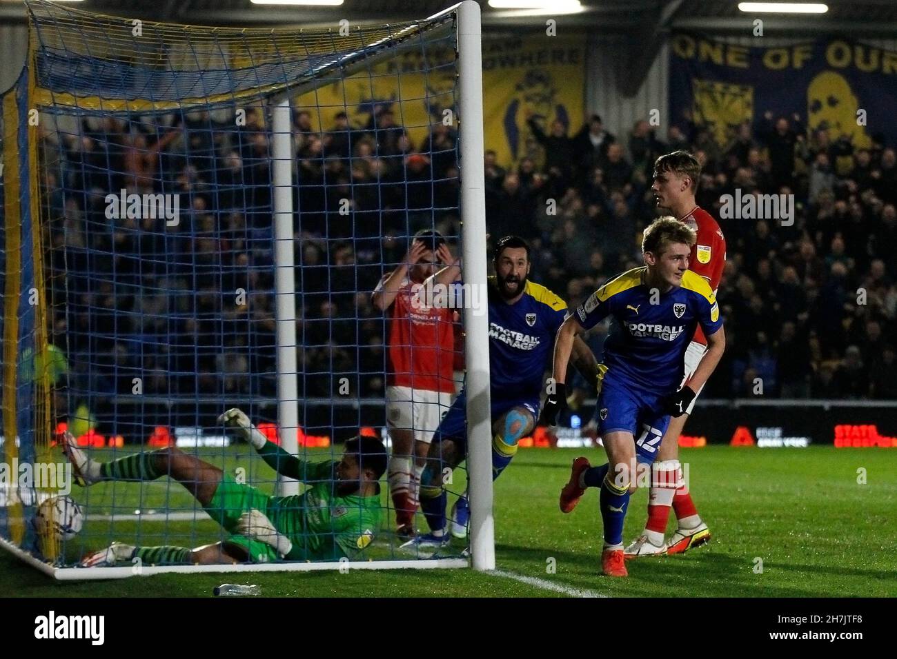 London, UK. 23rd Nov, 2021. GOAL - Jack Rudoni of AFC Wimbledon scores ...