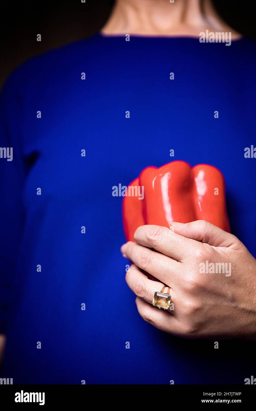 red pepper in the hand Stock Photo - Alamy