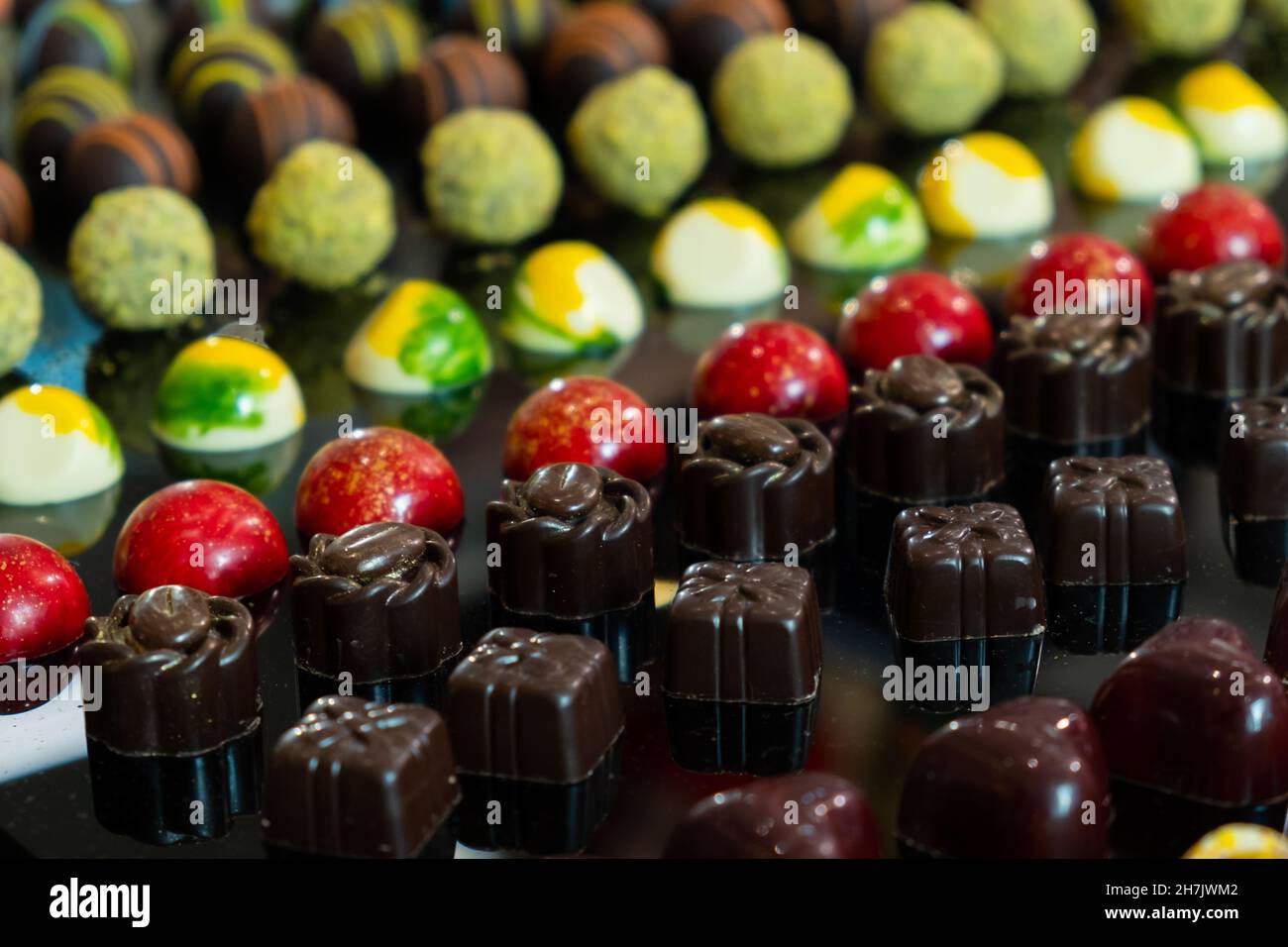 Colorful chocolate candies with different flavors. Exclusive delicious ...