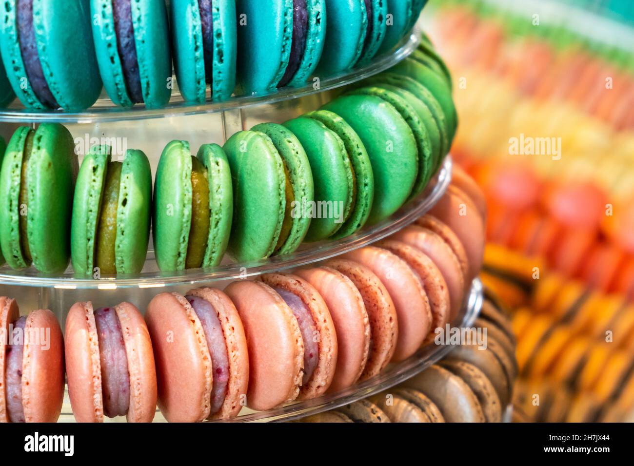 Colorful delicious French macarons pyramid for the candy bar for ...