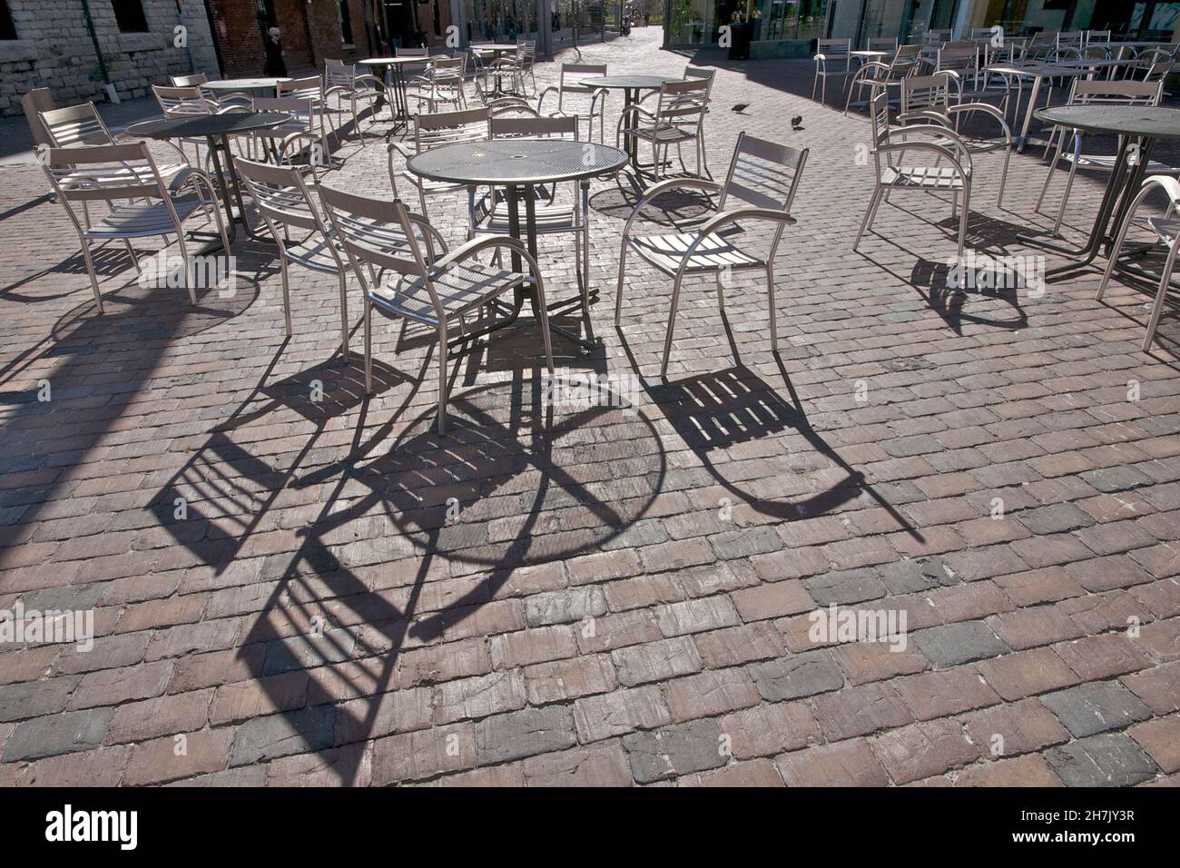 Light and shadow of the chair and table of the outdoor cafe Stock Photo ...
