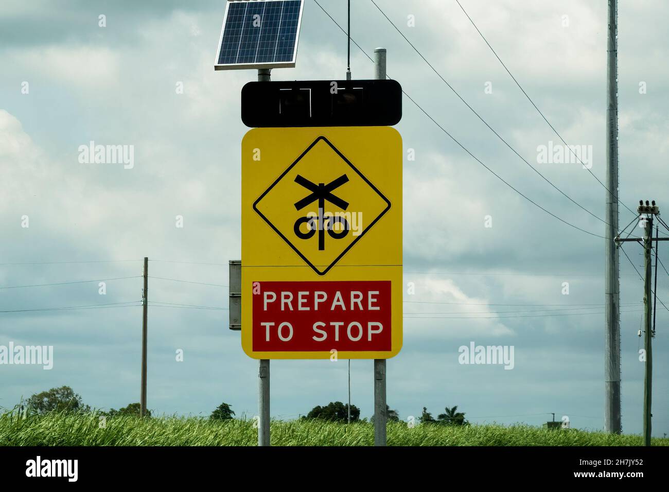 Prepare to stop sign at railway crossing with solar panel for power ...