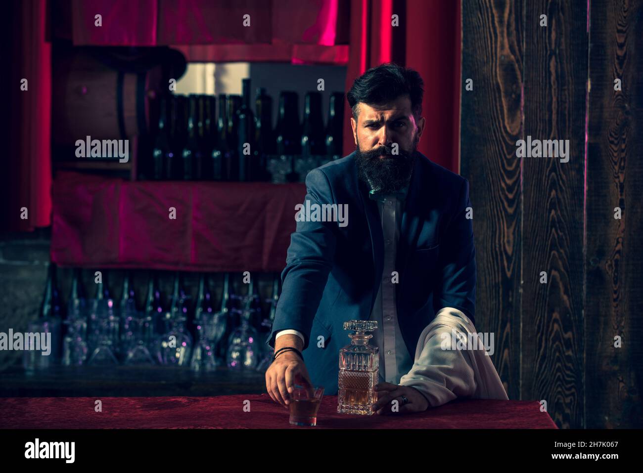 Male bartender leaning on bar hi-res stock photography and images - Alamy
