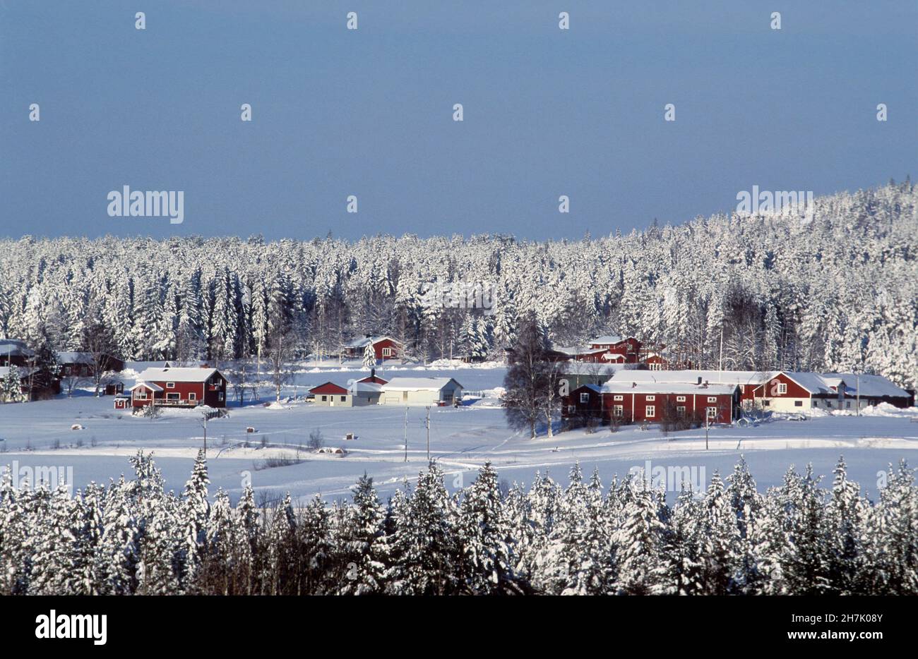 Rural country, Sweden in 2005, analog. View of some red buildings ...