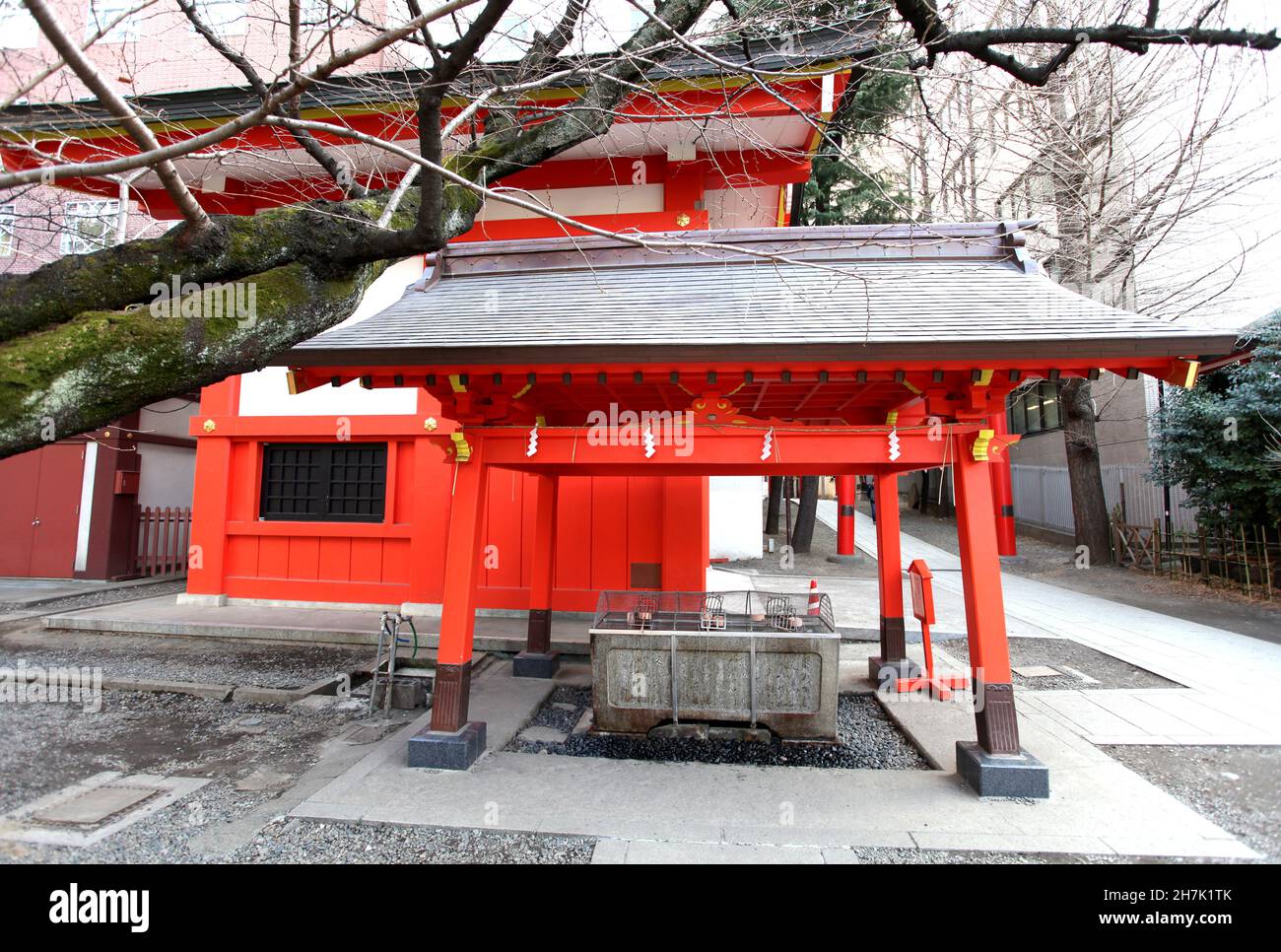 The Hanazono Shrine with vermilion colored buildings and torii gates in ...