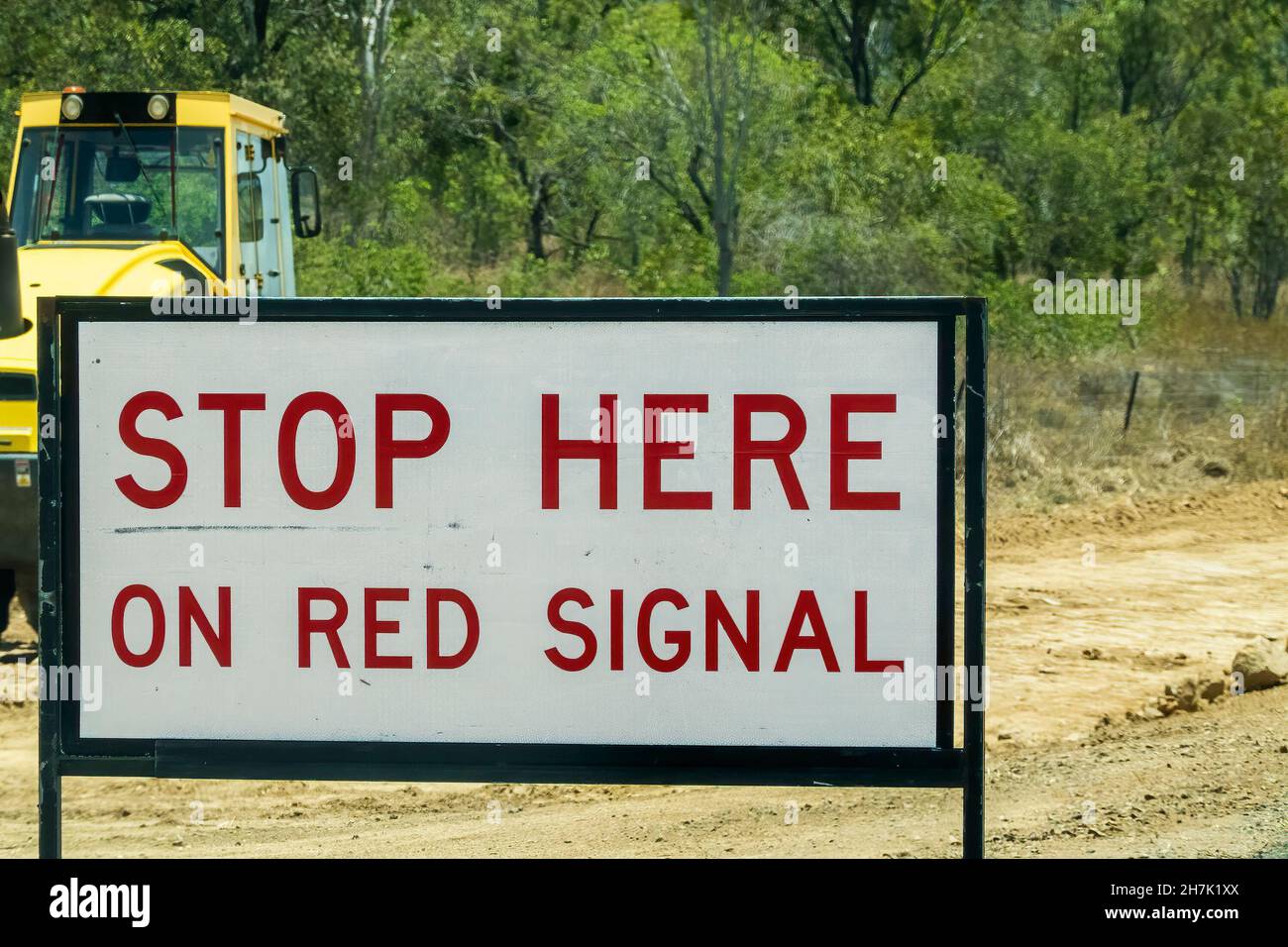 Roadside sign for construction work warning motorists to stop here on ...