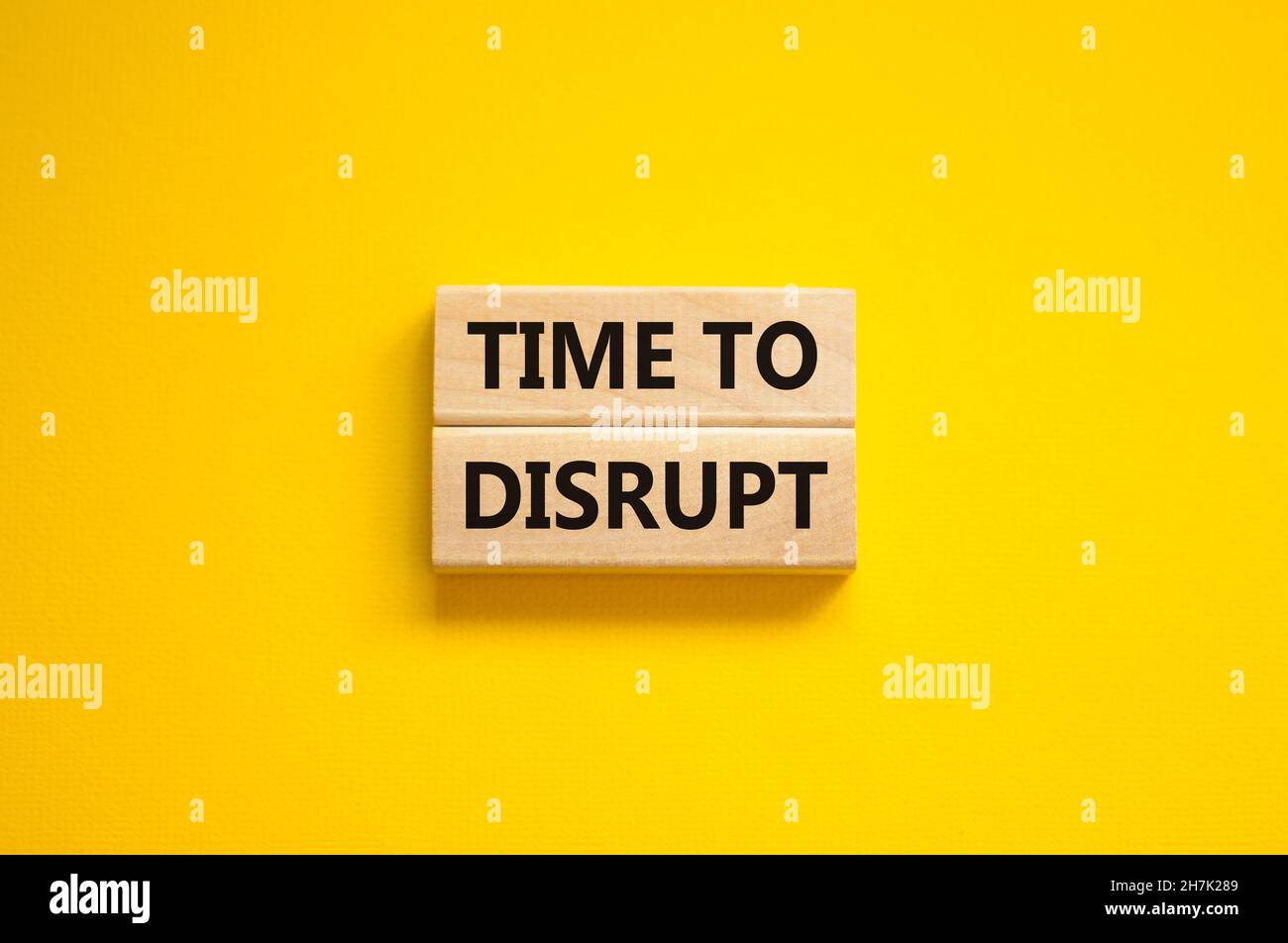 Time to disrupt symbol. Concept words Time to disrupt on wooden blocks ...