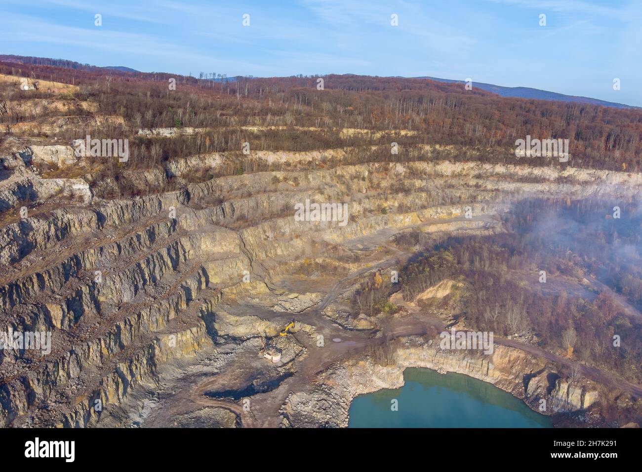 Aerial view from above of opencast mining quarry with rock quarry Stock ...