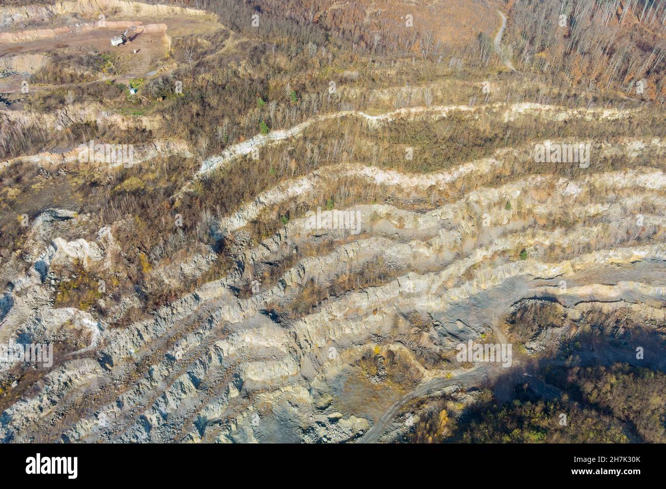Panoramic of stone quarry with open pit mine in mountain Stock Photo ...