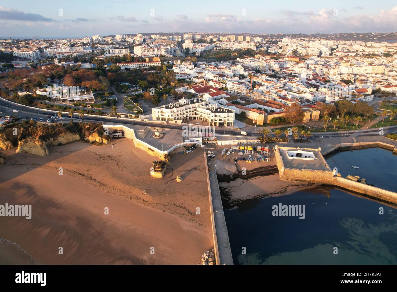 Aerial from the city Lagos in the Algarve Portugal at sunrise marina ...