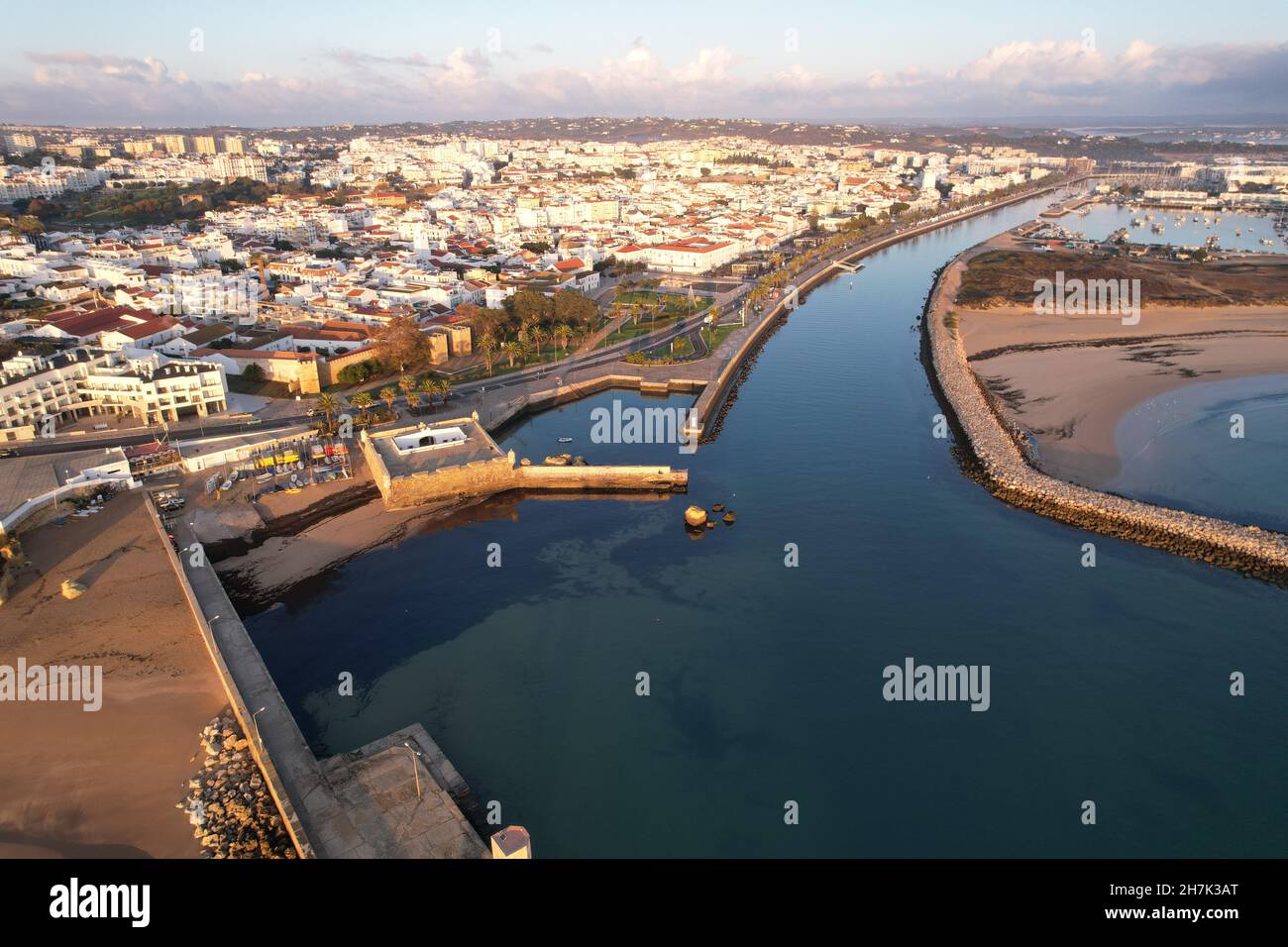 Aerial from the city Lagos in the Algarve Portugal at sunrise marina ...