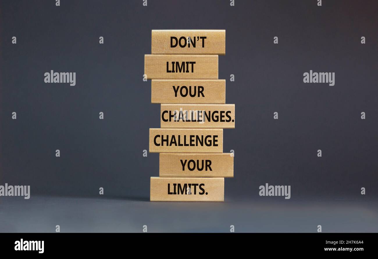 Do not limit your challenges symbol. Wooden blocks with words Do not ...