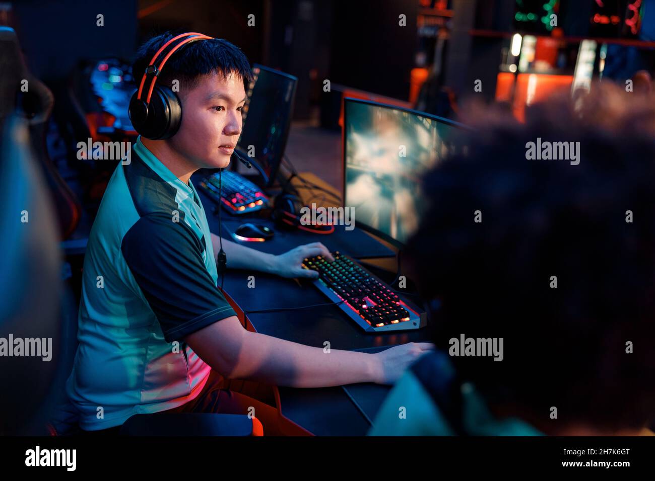 Young gamer participating in esports tournament in gaming club Stock ...