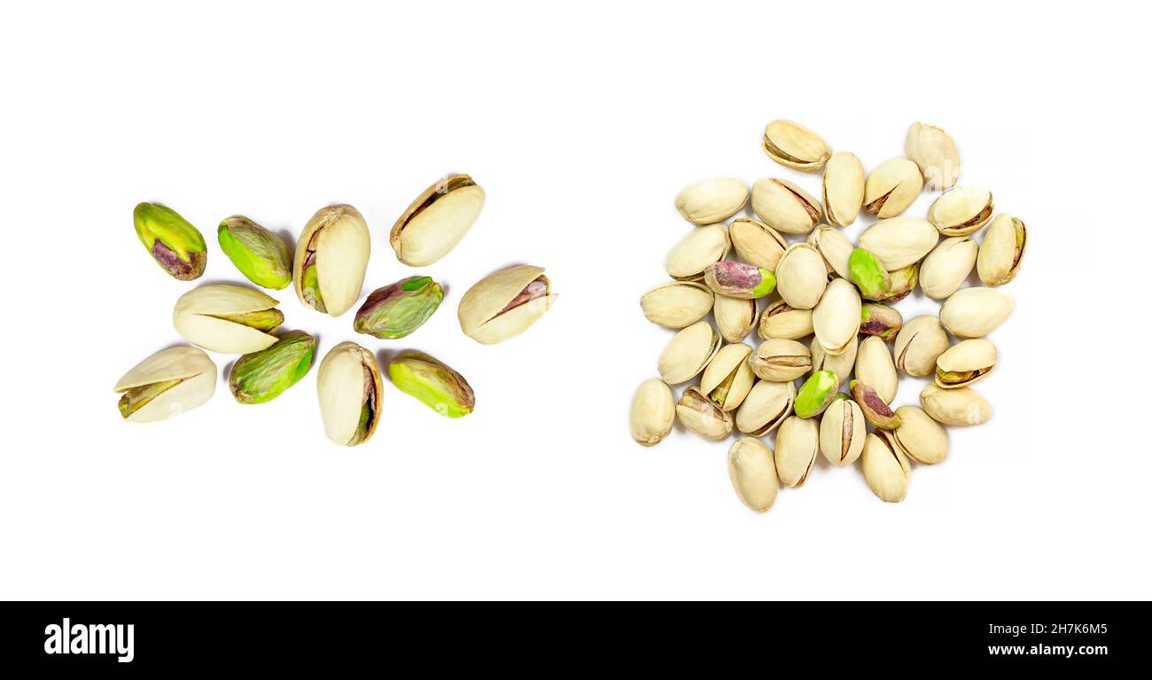 Top view of roasted salted pistachio nuts in nutshell set isolated on white background Stock ...