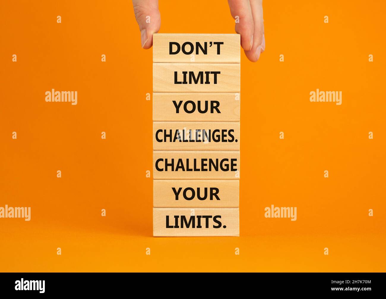 Do not limit your challenges symbol. Wooden blocks with words Do not ...