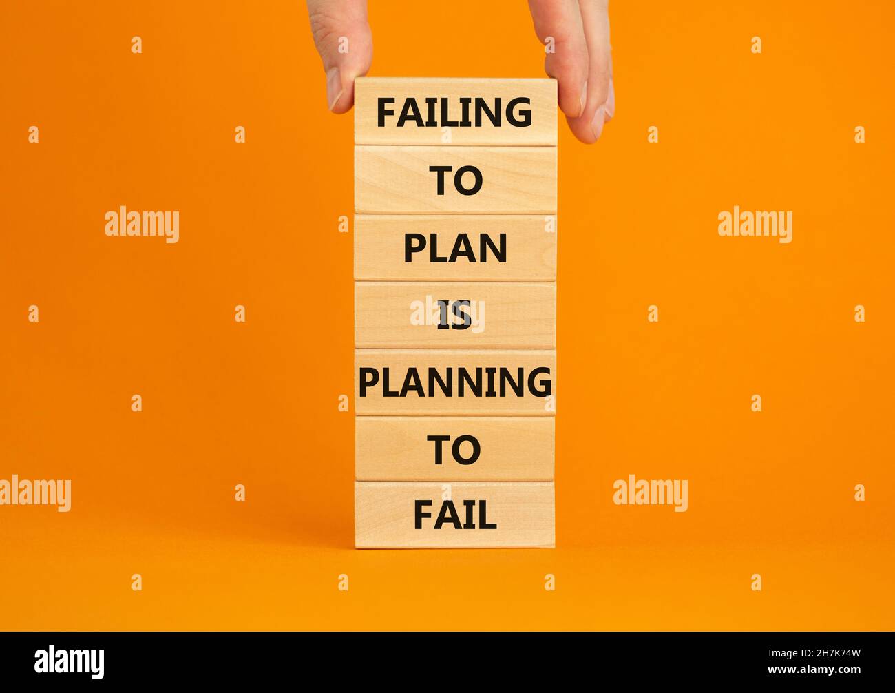 Failing to plan or planning fail symbol. Wooden blocks with words ...