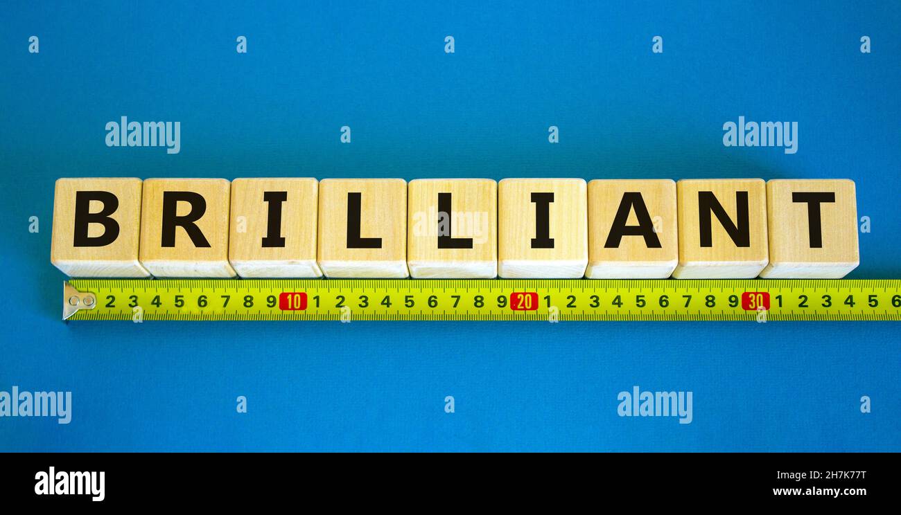 Brilliant symbol. The concept word Brilliant on wooden cubes. Yellow ...