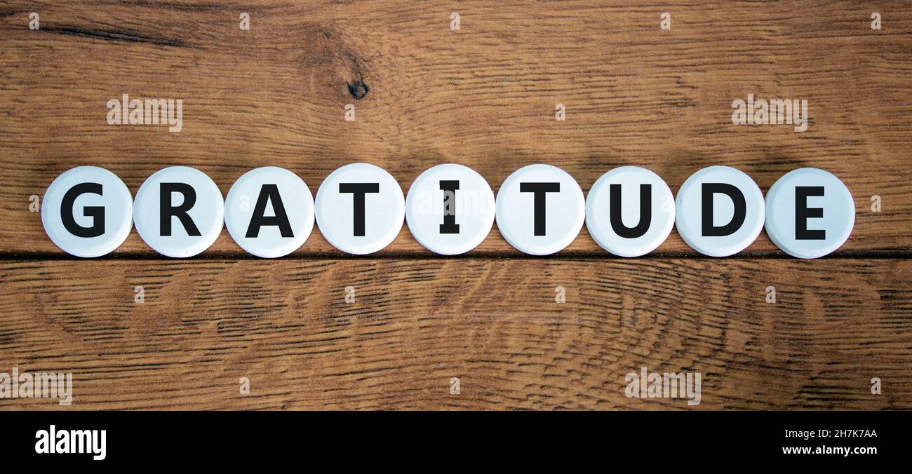 Gratitude symbol. The concept word Gratitude on white circles ...