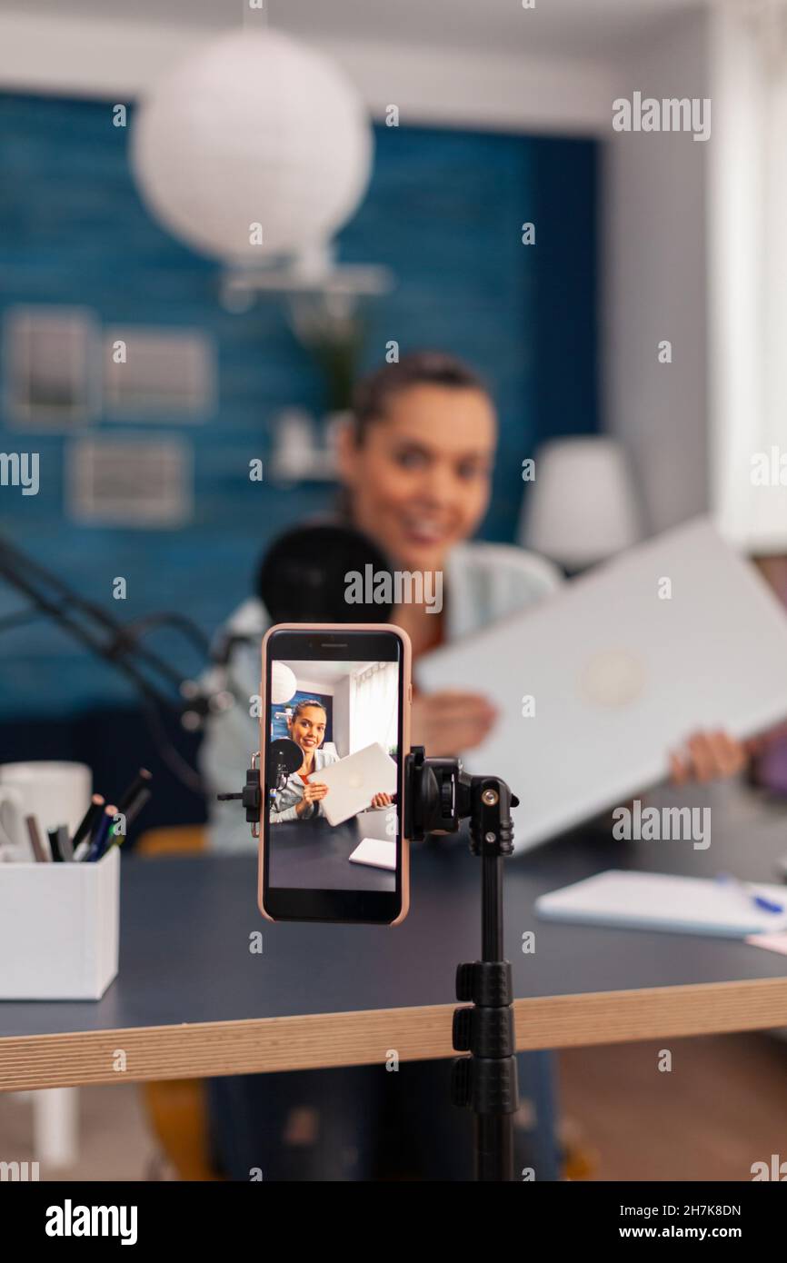 Closeup of smartphone recording product review. Mobile phone filming ...