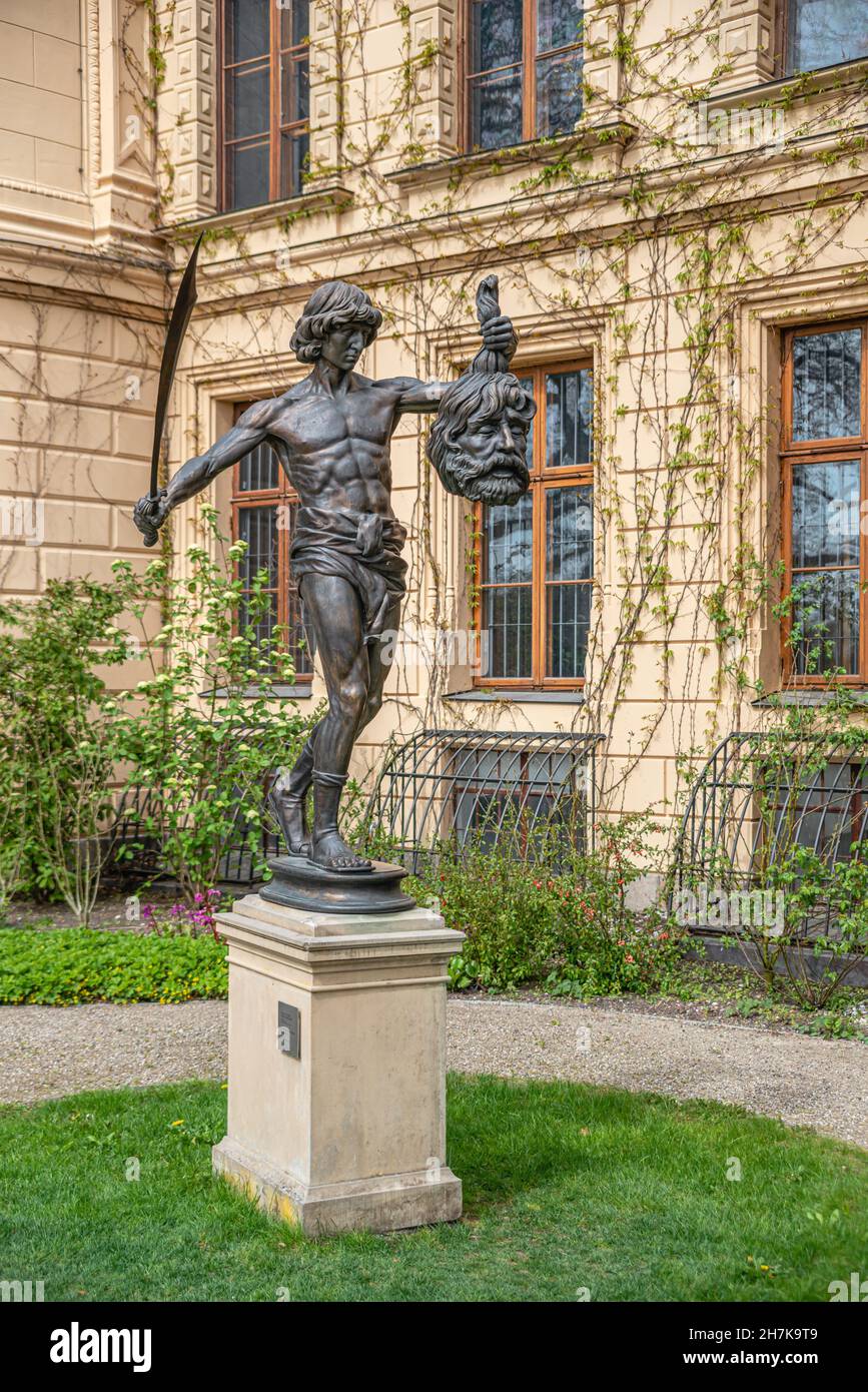 Sculpture of David with the severed head of Goliath in his hand ...