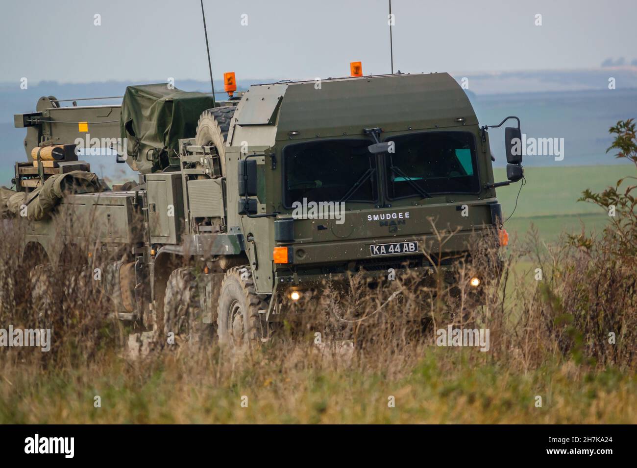 British army MAN SX45 32.430 8x8 Recovery Truck in action on a military ...