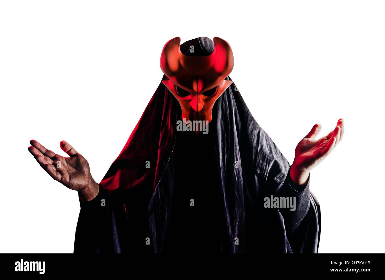 Isolated scary horror occult sectarian priest in black hood and metal ...