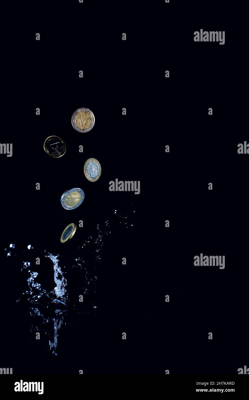 Falling money, euros, splashes, black background, levitation Stock ...