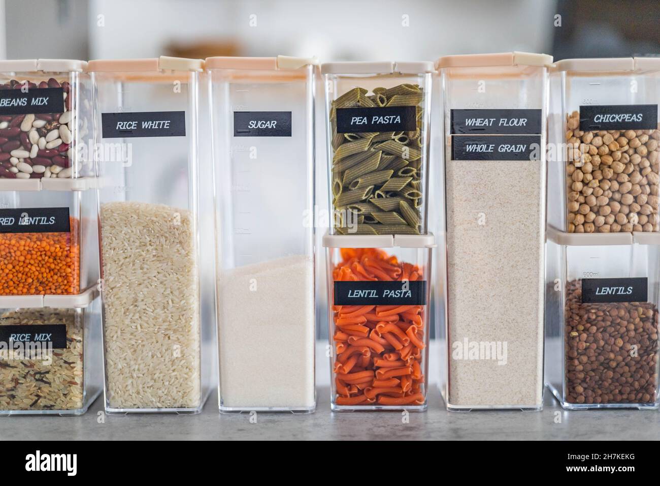 Kitchen storage organization use plastic case. Placing and sorting food ...