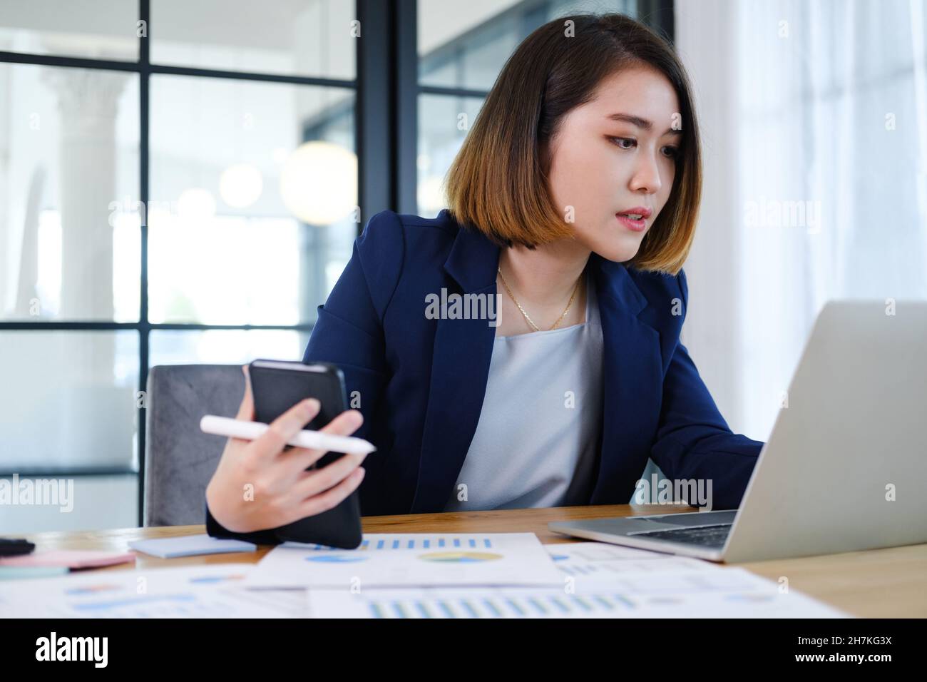 Portrait of beautiful and smart young entrepreneur businesswoman ...