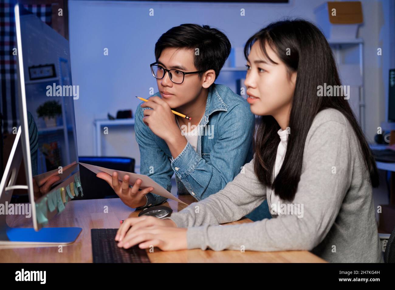 Programmer and developer teamwork working in a software development and coding technologies at ...