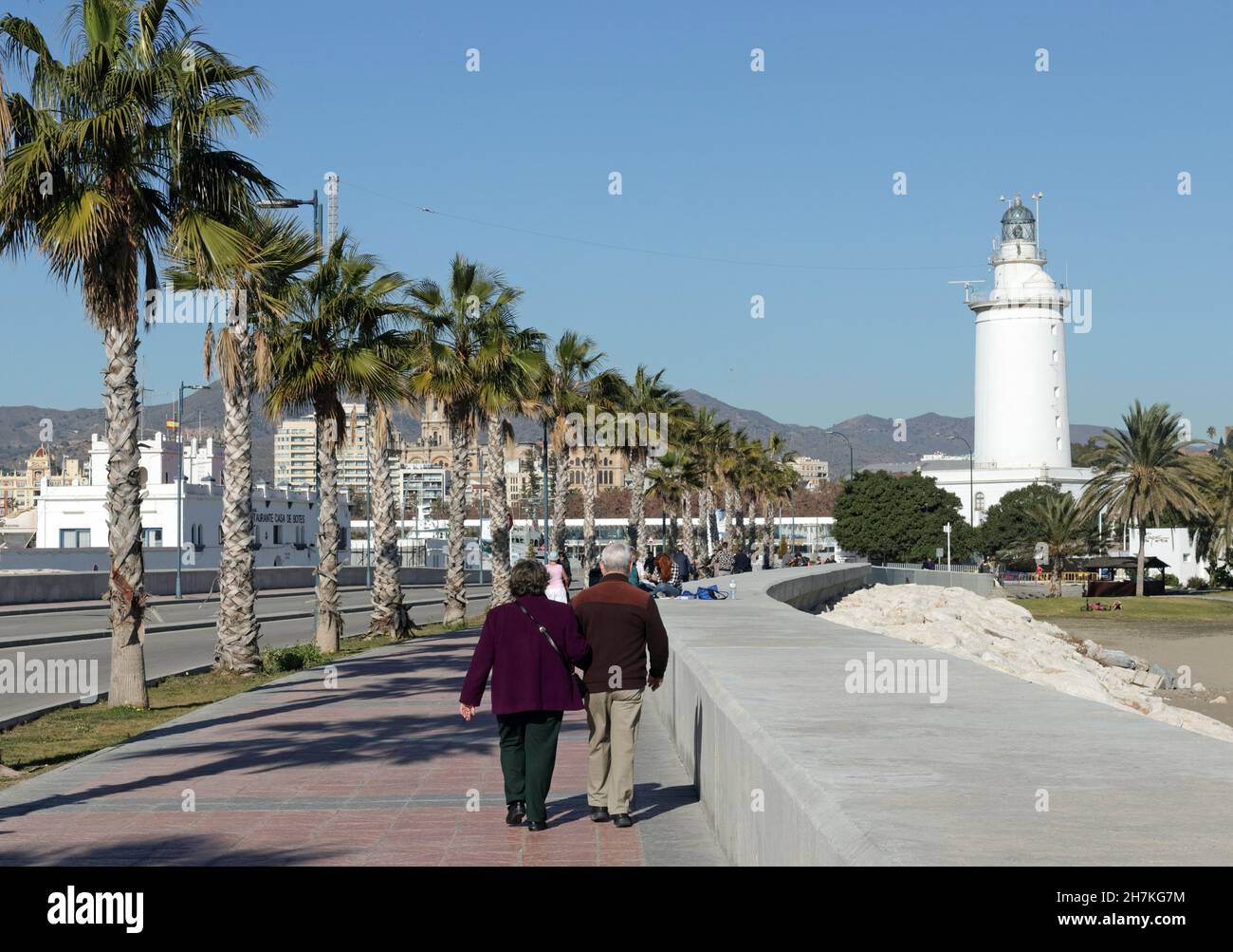 MALAGA, SPAIN - Jan 17, 2019: Malaga, Spain, elderly couple walking on ...