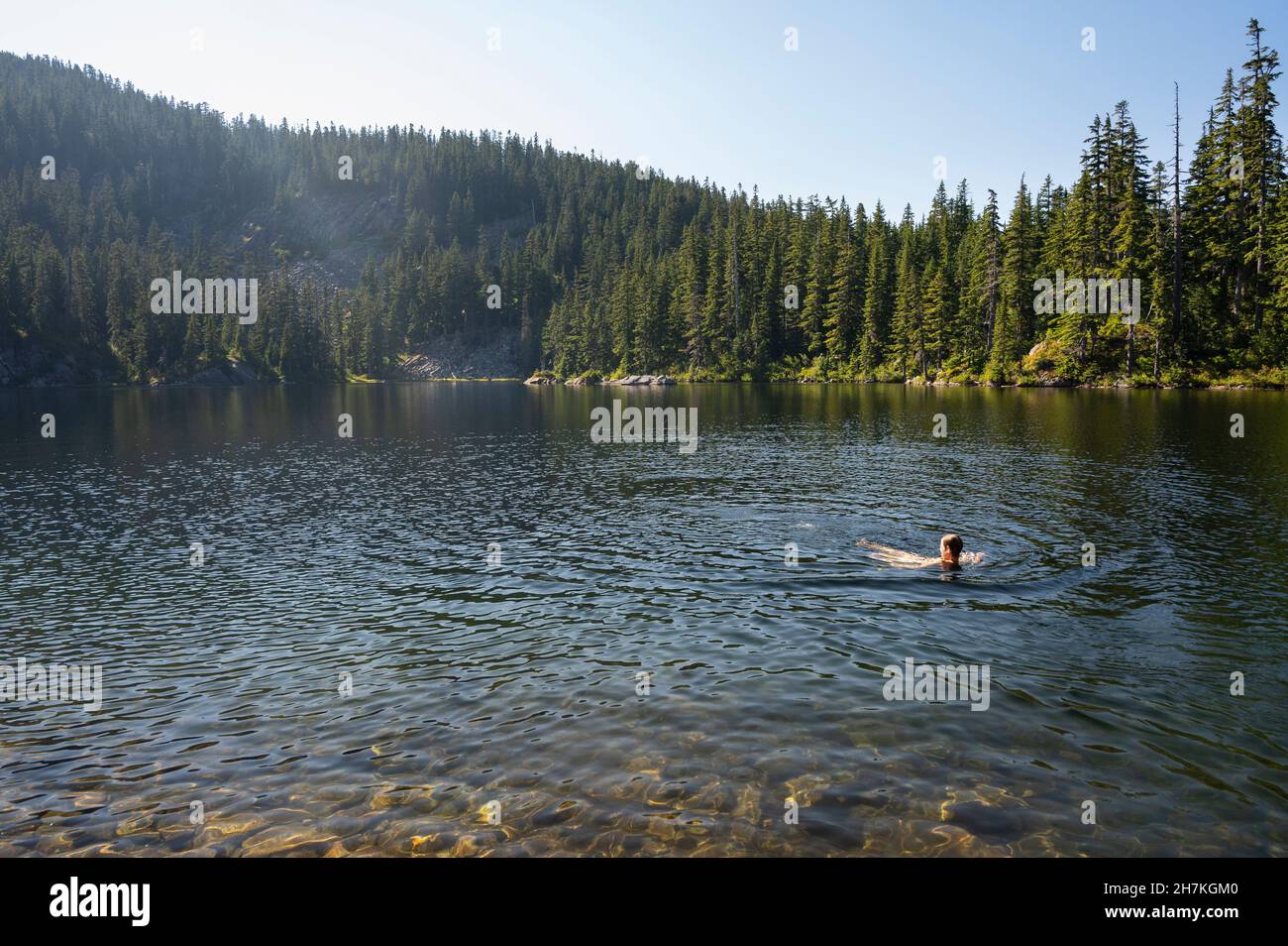Guy in alpine mountains hi-res stock photography and images - Alamy