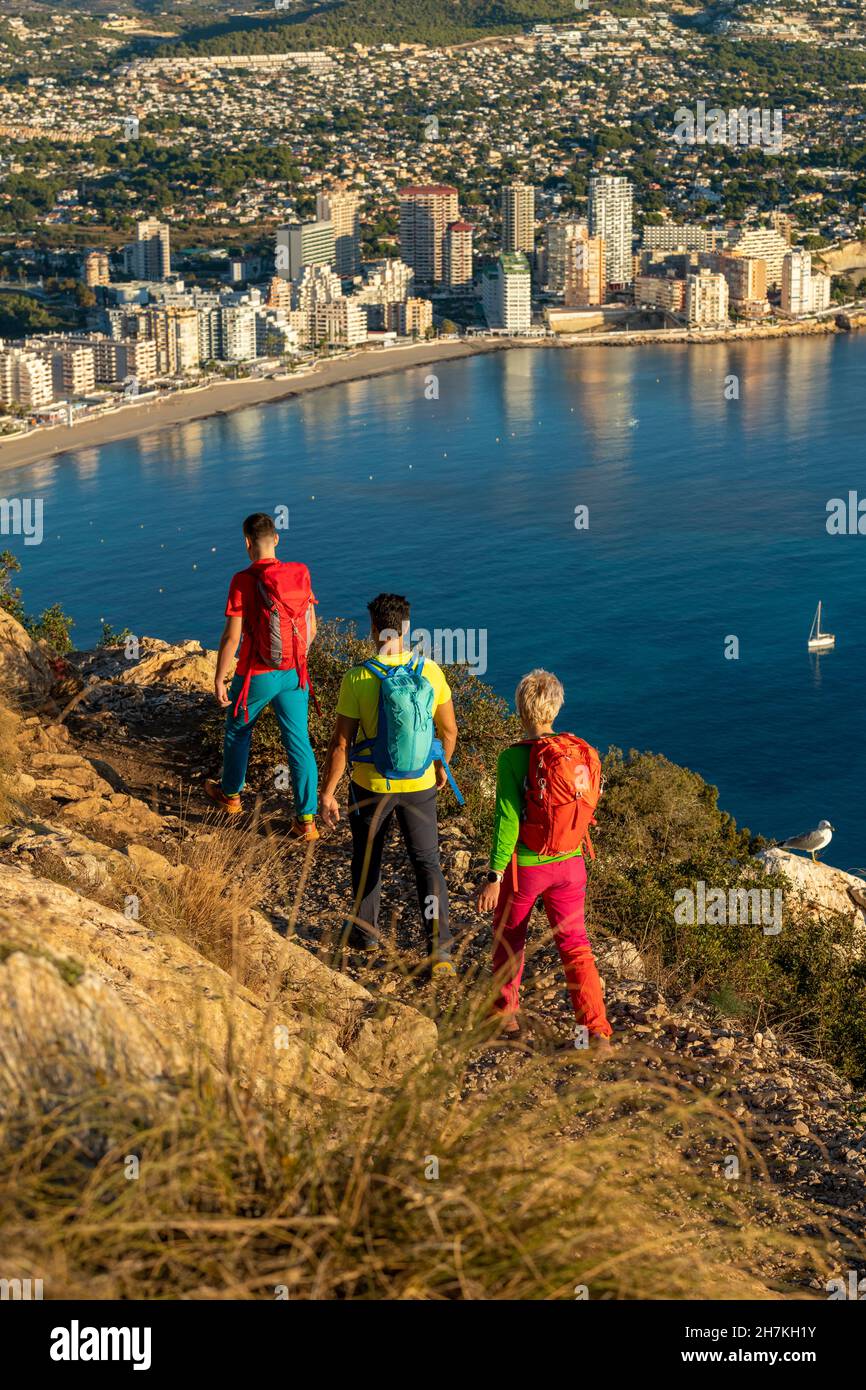 A group of young friends, together hiking on the mountain, Peñon de ...