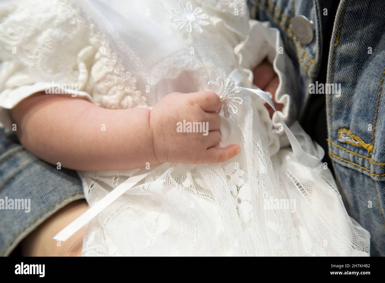 The right hand of the baby being held Stock Photo - Alamy