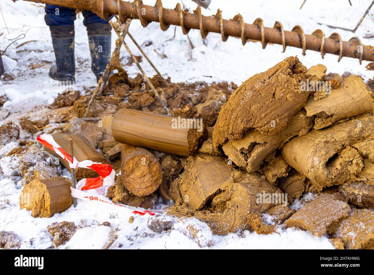 Pieces of soil extracted from a well piled up in a heap, in the ...