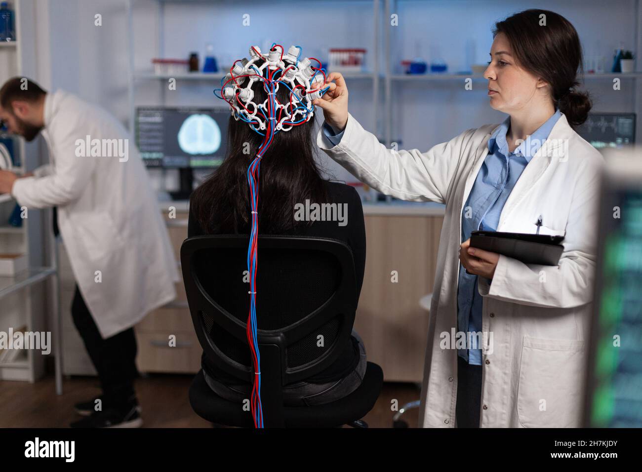 Specialist neurologist doctor monitoring brain evolution of patient ...